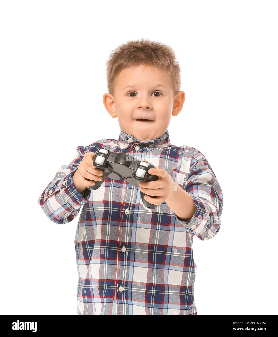 Cute little boy playing video games on white background Stock Photo - Alamy