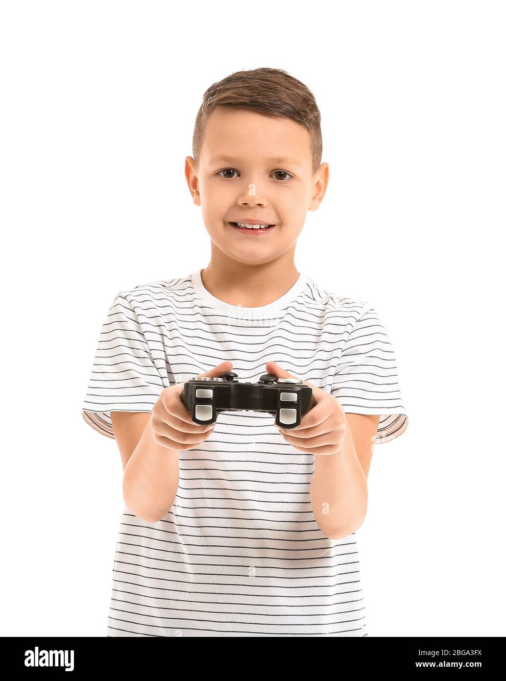 Cute little boy playing video game on white background Stock Photo - Alamy
