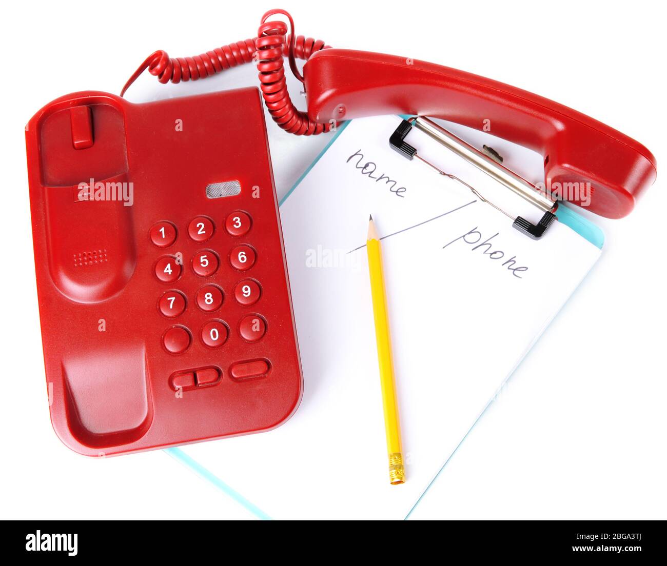 Telephone and notepad and other items, isolated on white Stock Photo ...