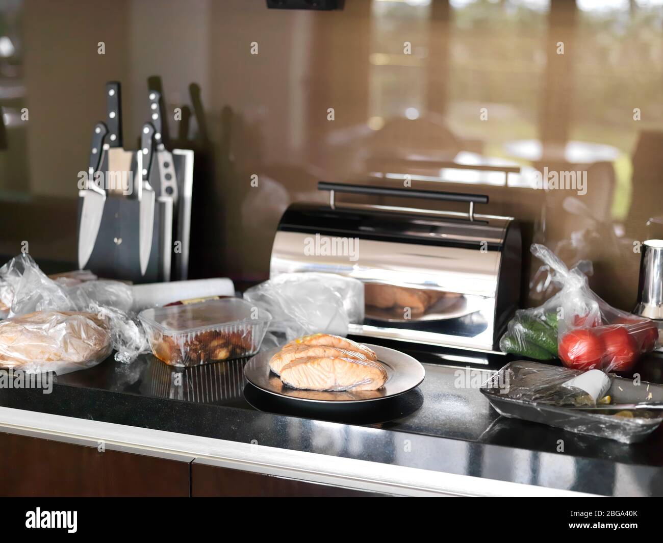 Various food on a stove top, indoor close up Stock Photo - Alamy