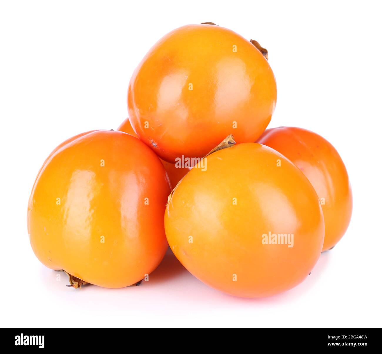 Ripe persimmons isolated on white Stock Photo - Alamy