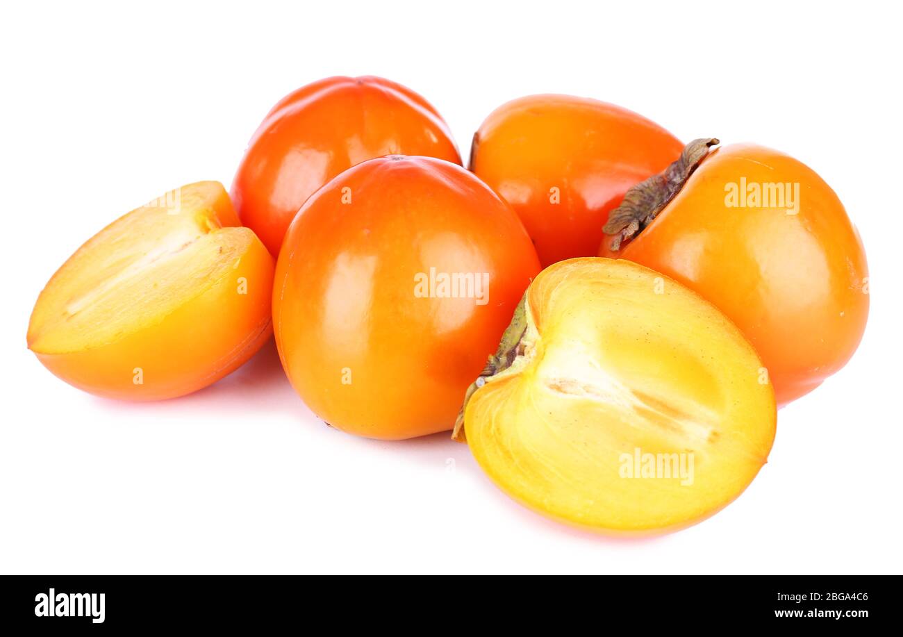 Ripe persimmons isolated on white Stock Photo - Alamy