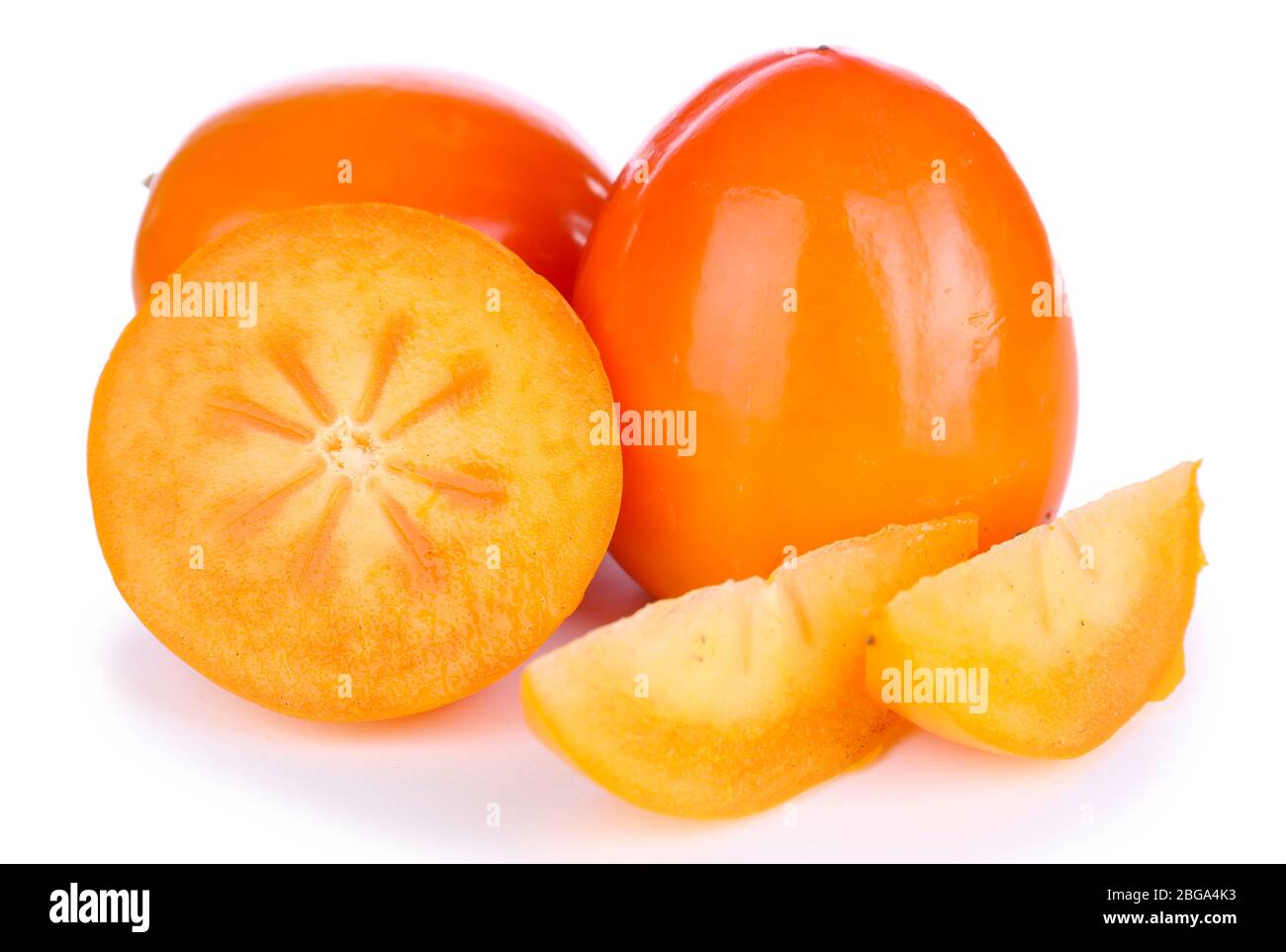Ripe persimmons isolated on white Stock Photo - Alamy