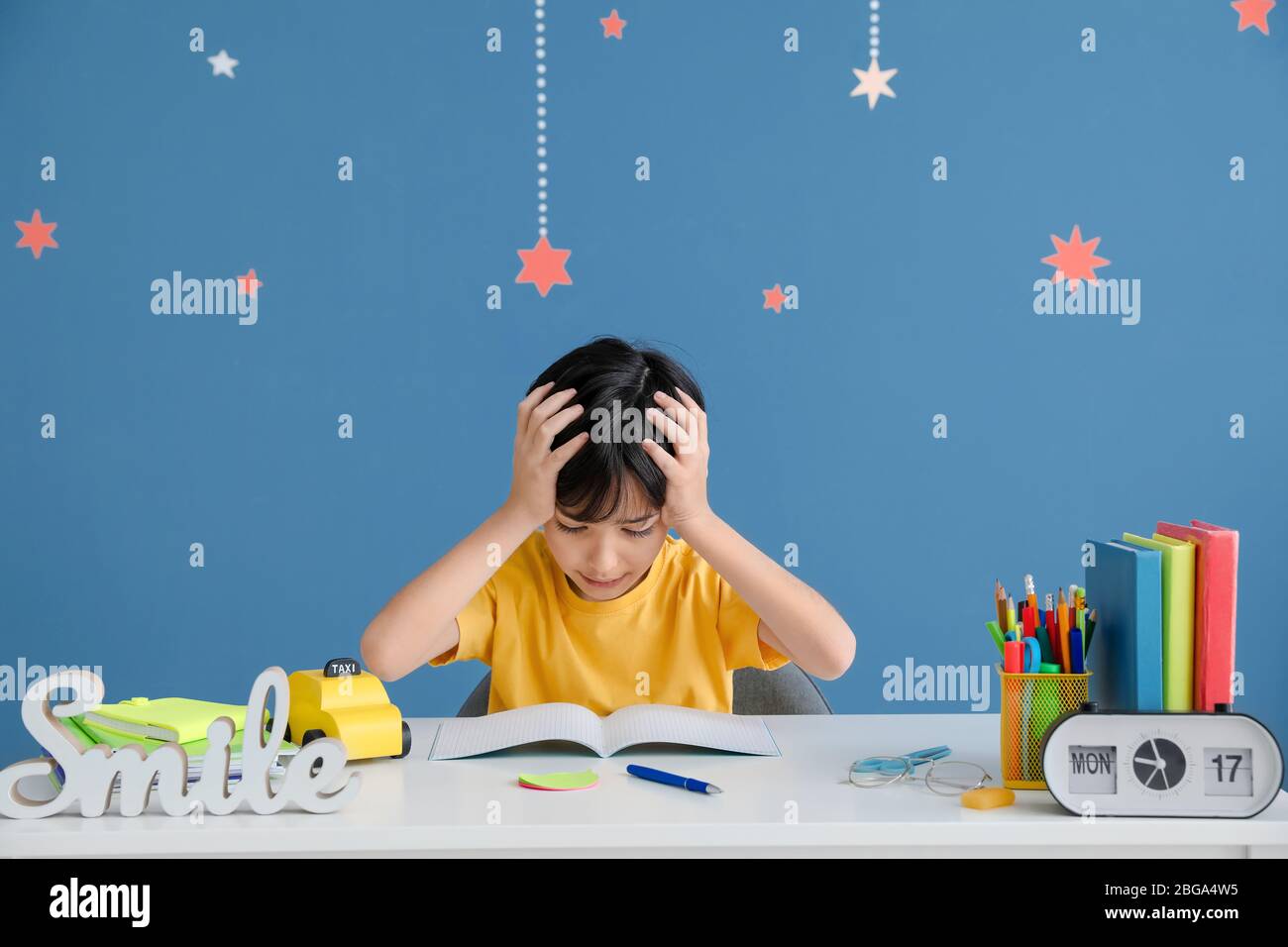 Children homework stressed hi-res stock photography and images - Alamy