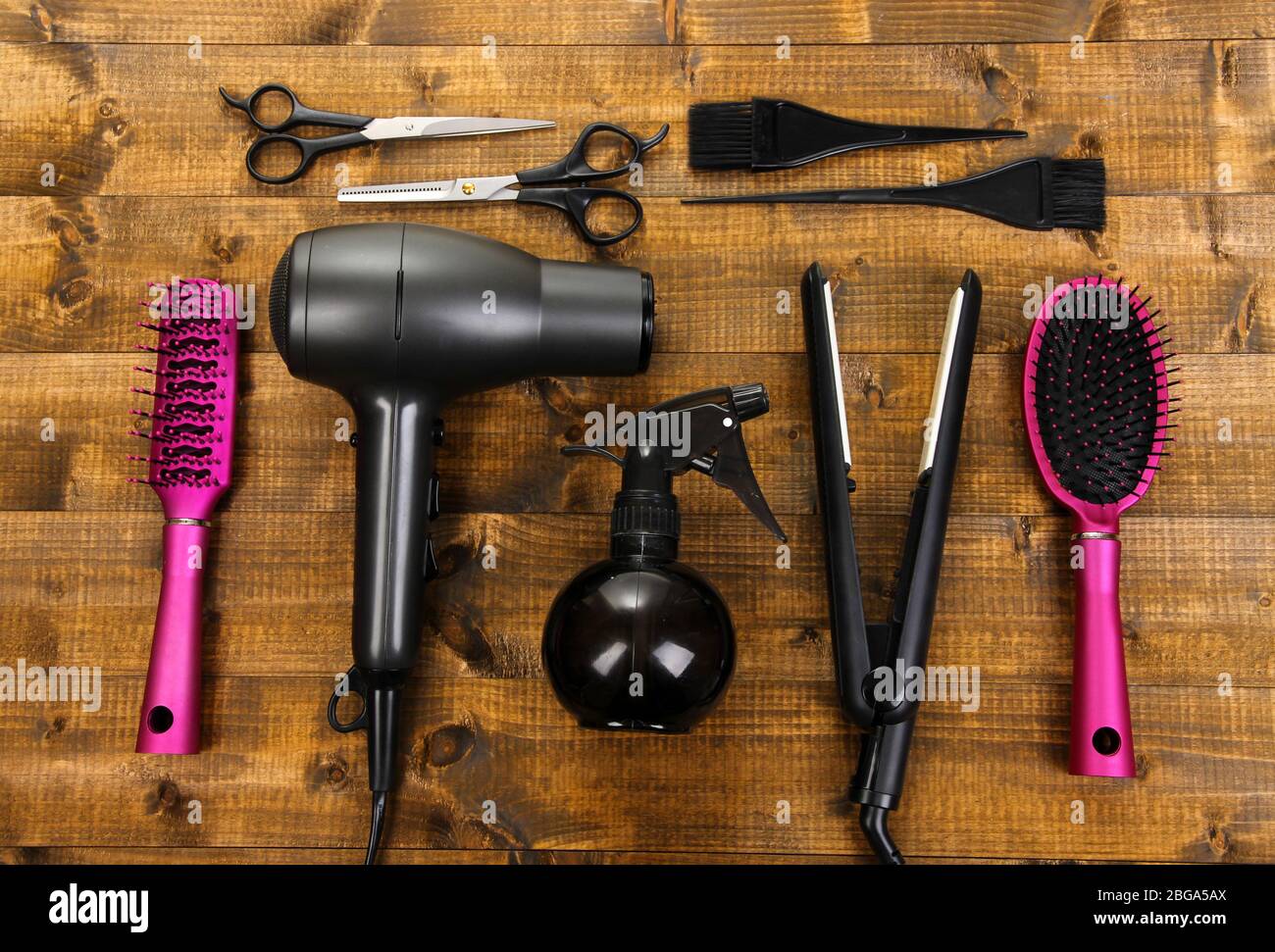 Hairdressing tools on wooden table close-up Stock Photo - Alamy