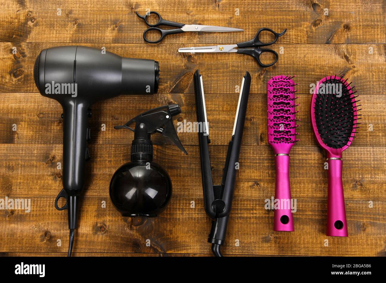 Hairdressing tools on wooden table close-up Stock Photo - Alamy