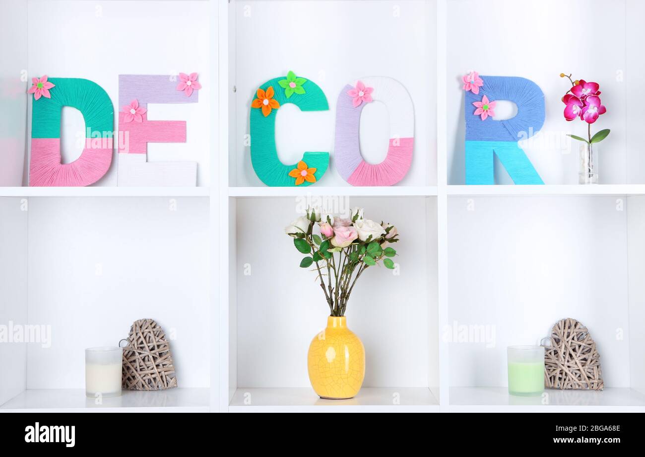 White shelves decorated with handmade knit word Stock Photo - Alamy