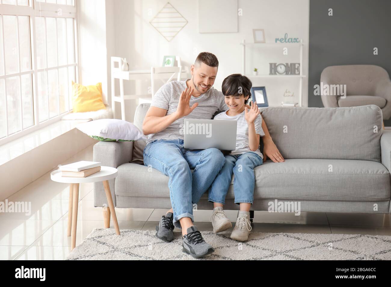 Family video chatting at home Stock Photo - Alamy
