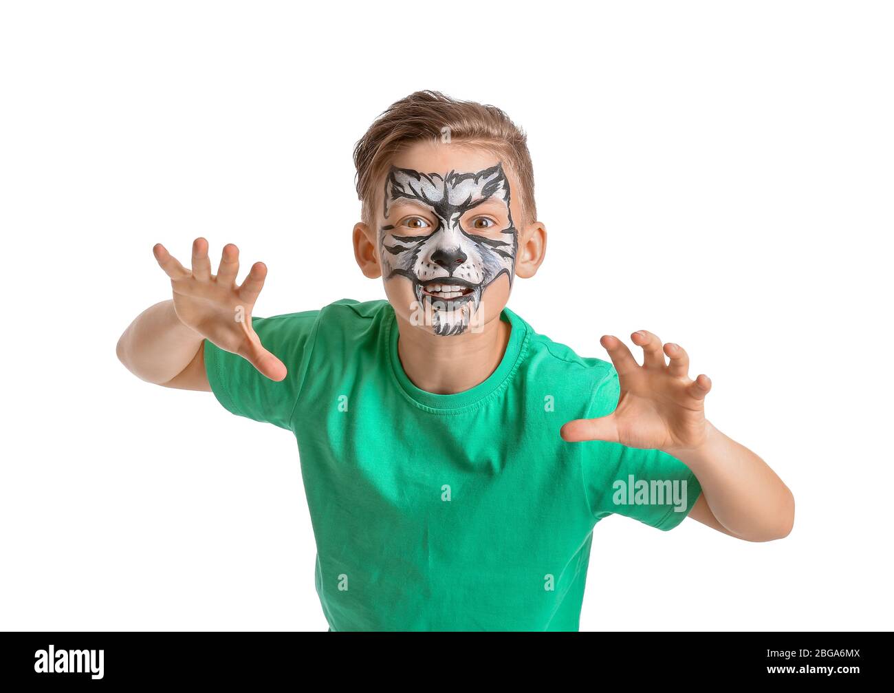 Funny little boy with face painting on white background Stock Photo - Alamy