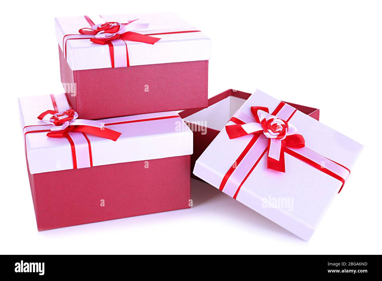 Beautiful gift boxes isolated on white Stock Photo - Alamy