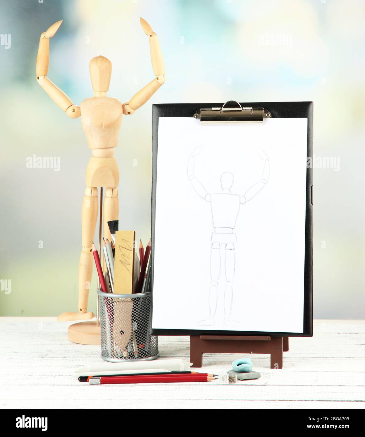 Sketch with professional art materials, on wooden table Stock Photo - Alamy