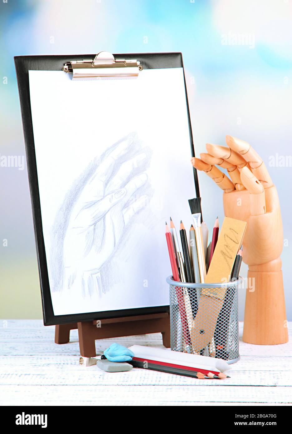 Sketch with professional art materials, on wooden table Stock Photo - Alamy