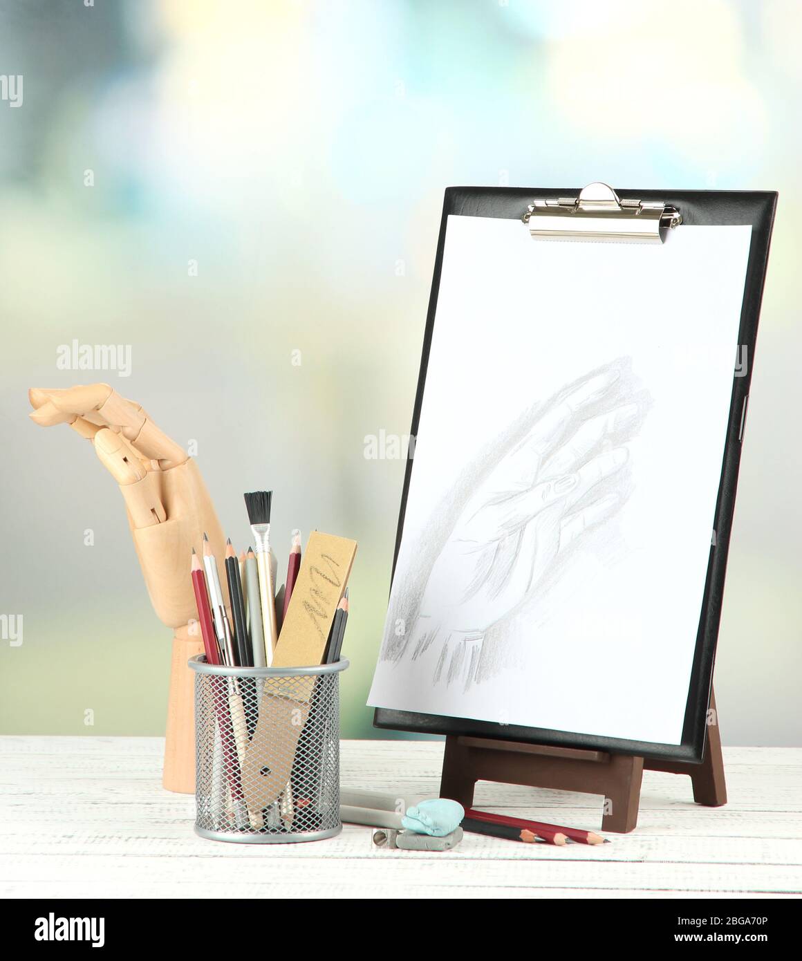 Sketch with professional art materials, on wooden table Stock Photo - Alamy