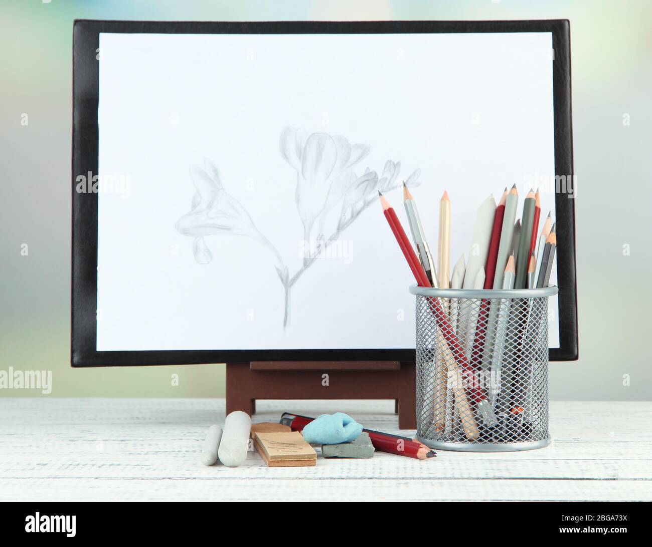 Sketch with professional art materials, on wooden table Stock Photo - Alamy