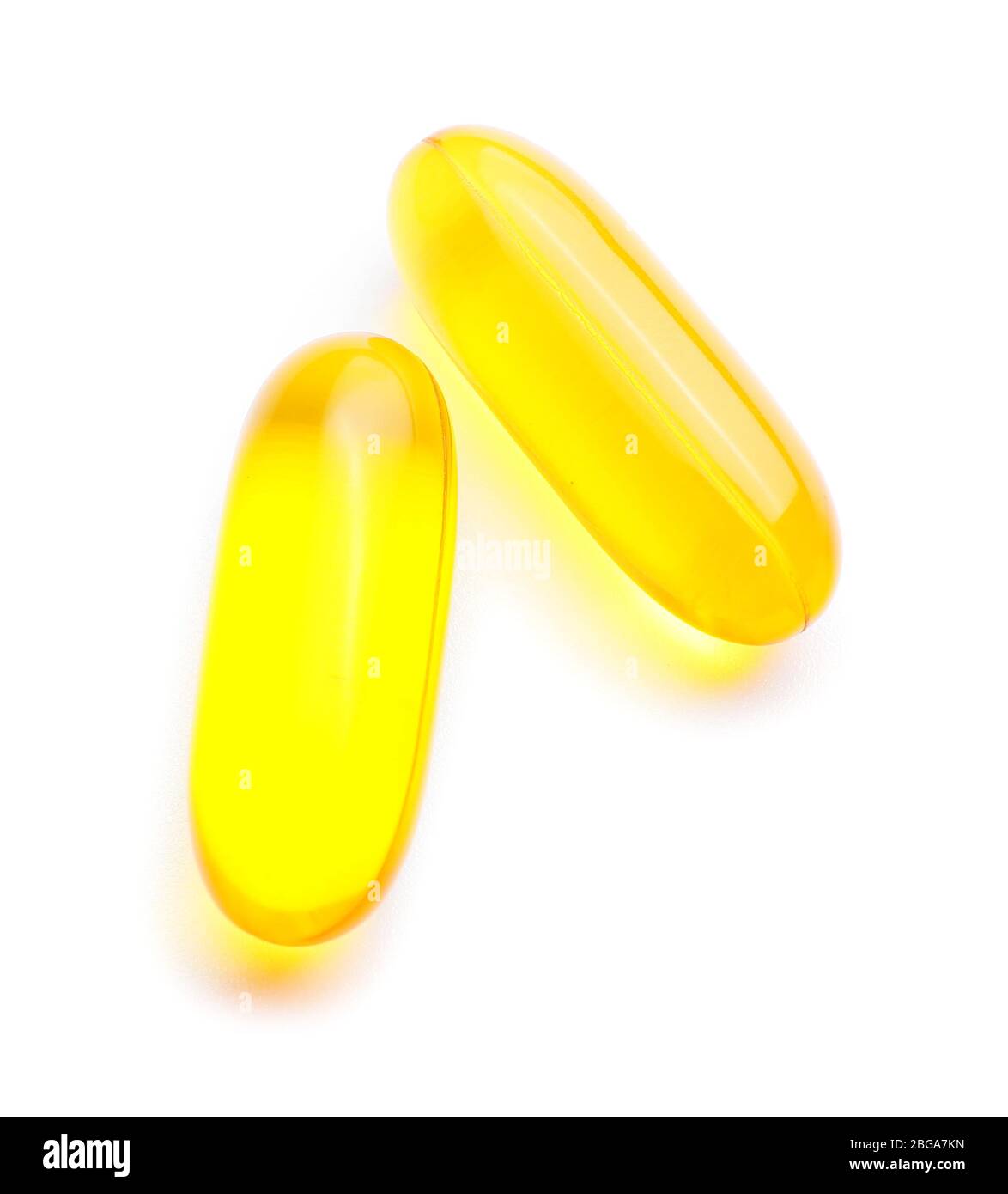 Fish oil capsules on white background Stock Photo - Alamy