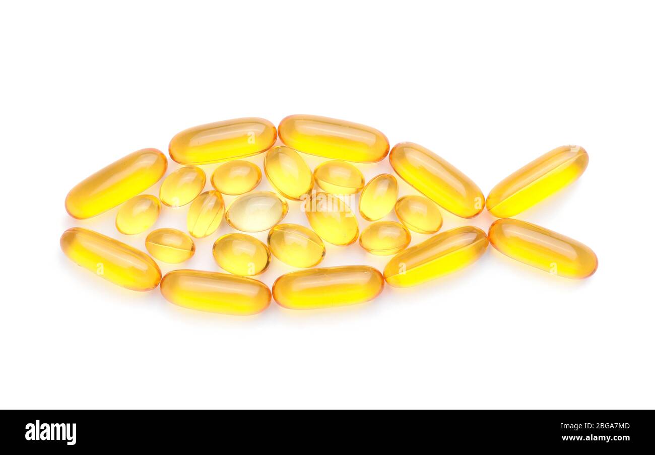 Composition with fish oil capsules on white background Stock Photo - Alamy