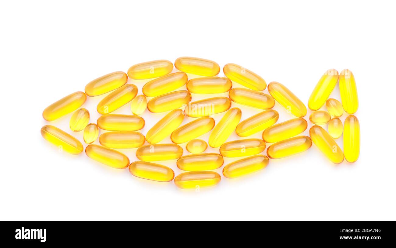 Composition with fish oil capsules on white background Stock Photo - Alamy