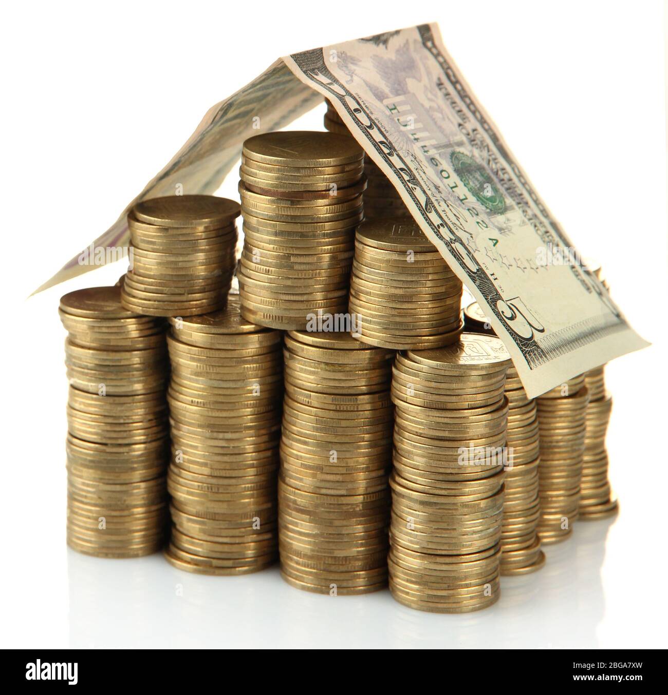 Coins house isolated on white Stock Photo - Alamy