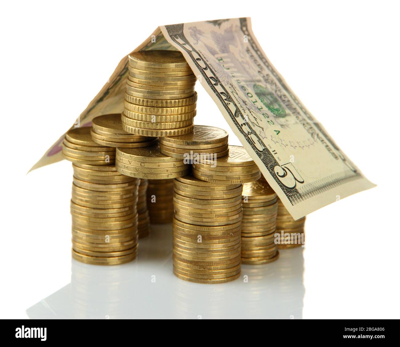 Coins house isolated on white Stock Photo - Alamy