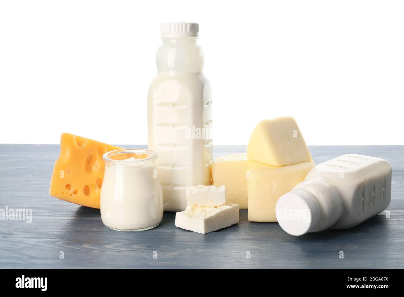 Different dairy products on table against white background Stock Photo ...
