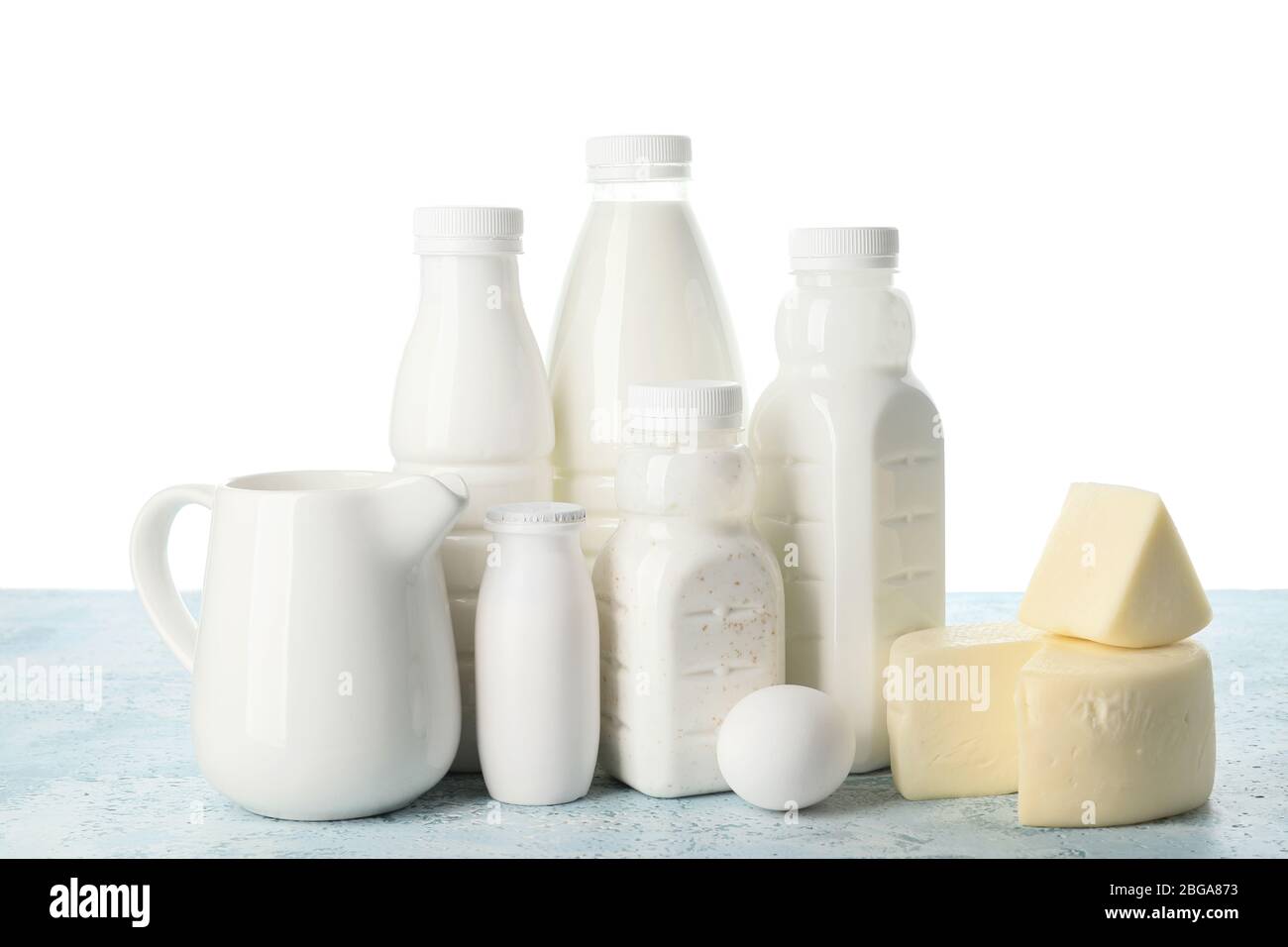 Different dairy products on table against white background Stock Photo ...
