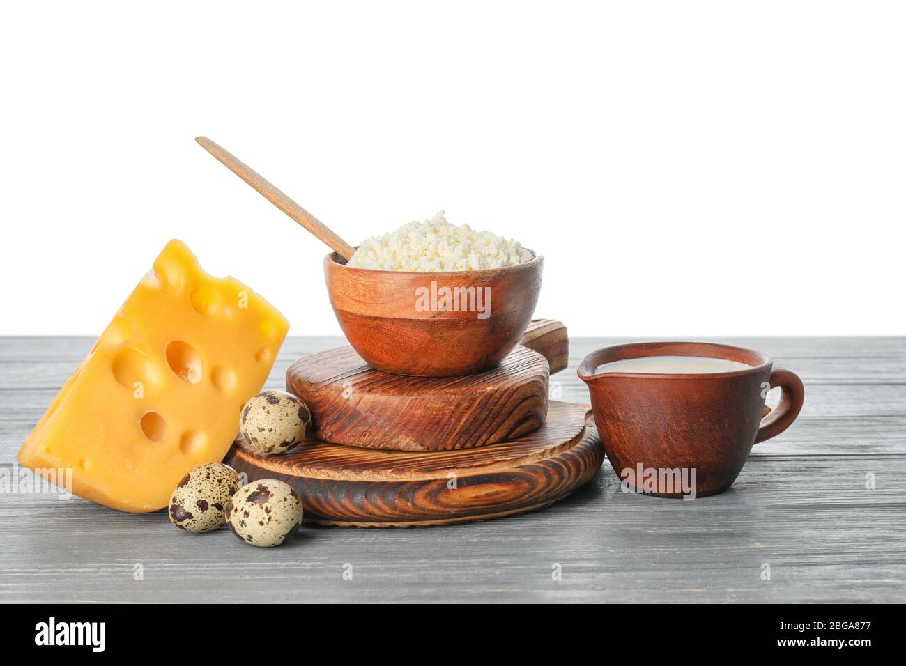 Different dairy products on table against white background Stock Photo ...