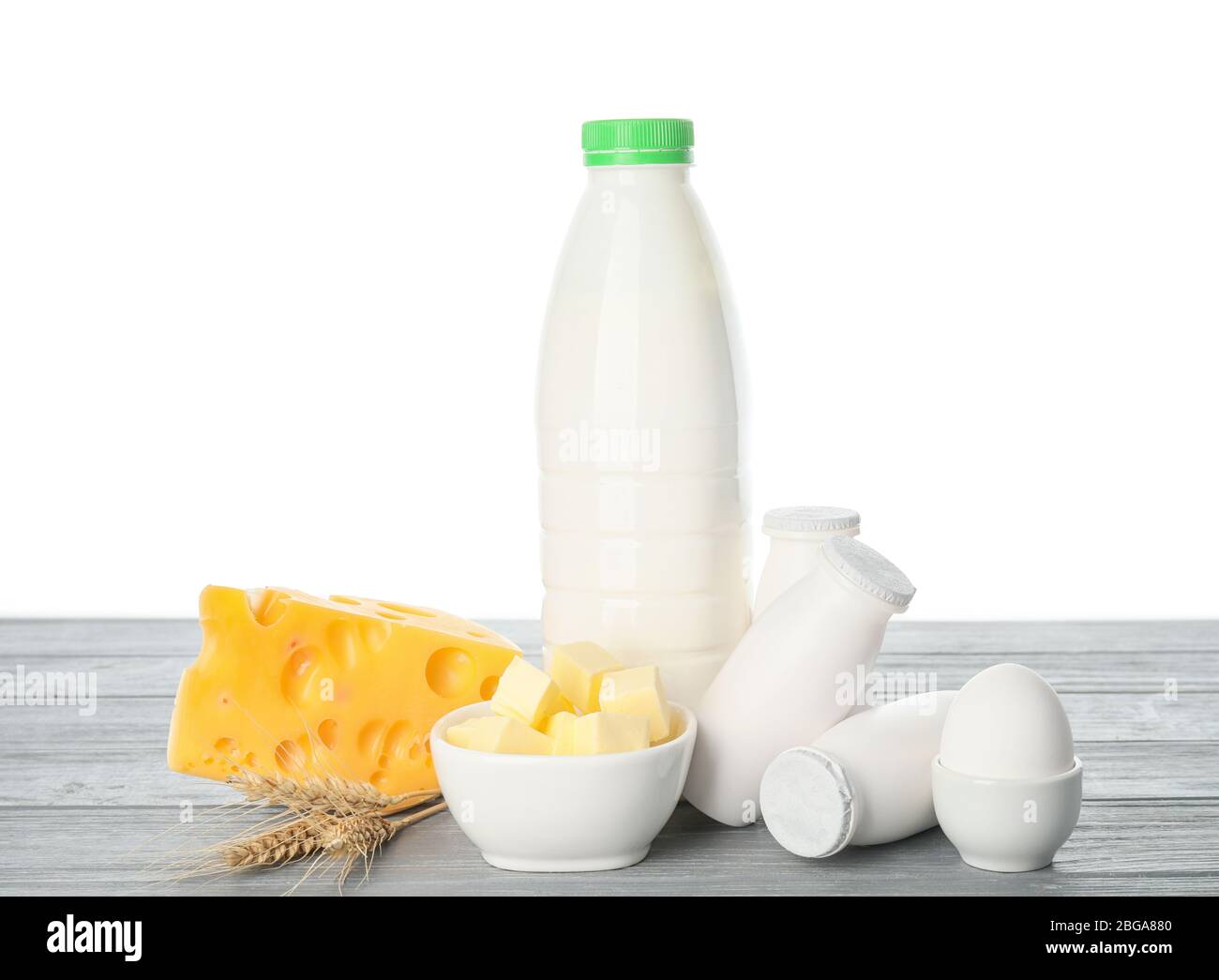 Different dairy products on table against white background Stock Photo ...