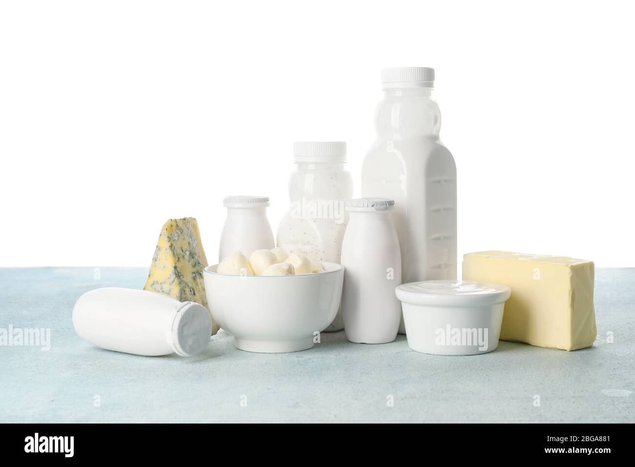 Different dairy products on table against white background Stock Photo ...
