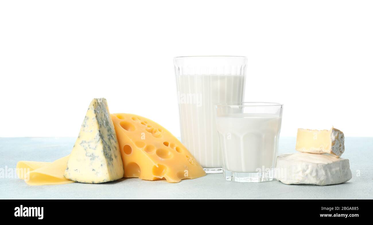 Different dairy products on table against white background Stock Photo ...