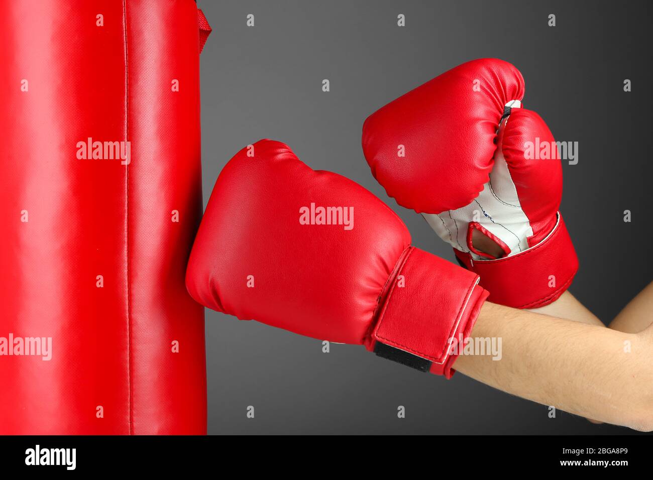 Box training and punching bag, on color background Stock Photo - Alamy