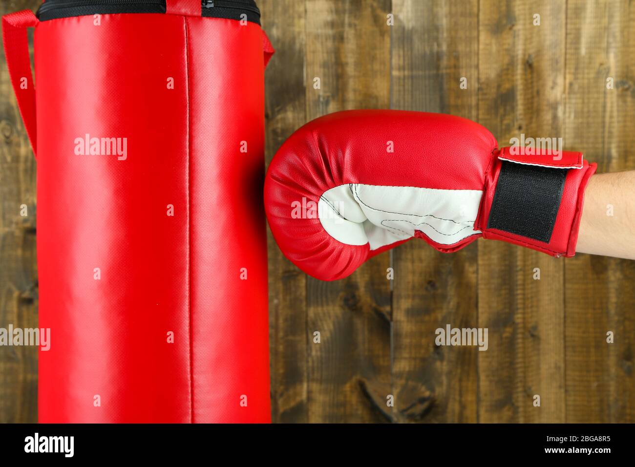 Box training and punching bag, on wooden background Stock Photo - Alamy