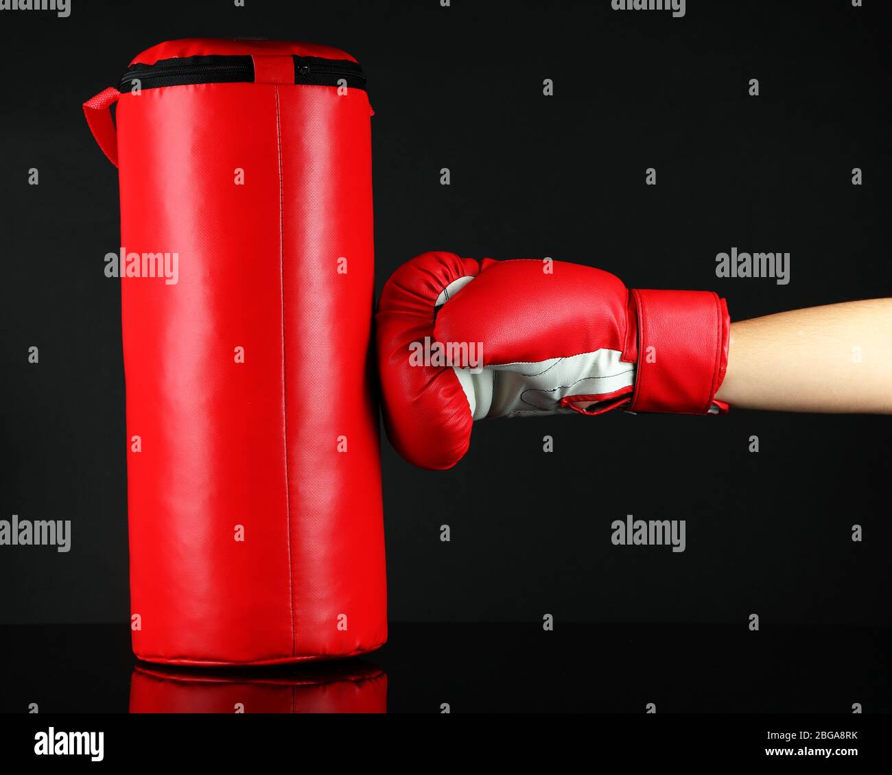Box training and punching bag, isolated on black Stock Photo - Alamy