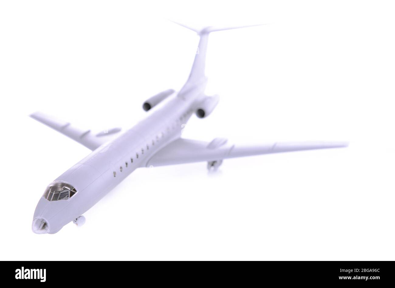 Plastic airplane isolated on white Stock Photo - Alamy