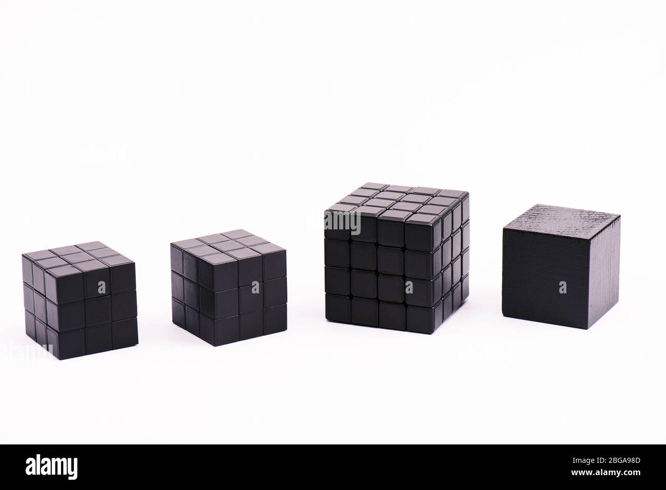 KYIV, UKRAINE - FEBRUARY 21, 2020: black rubik cubes isolated on white ...