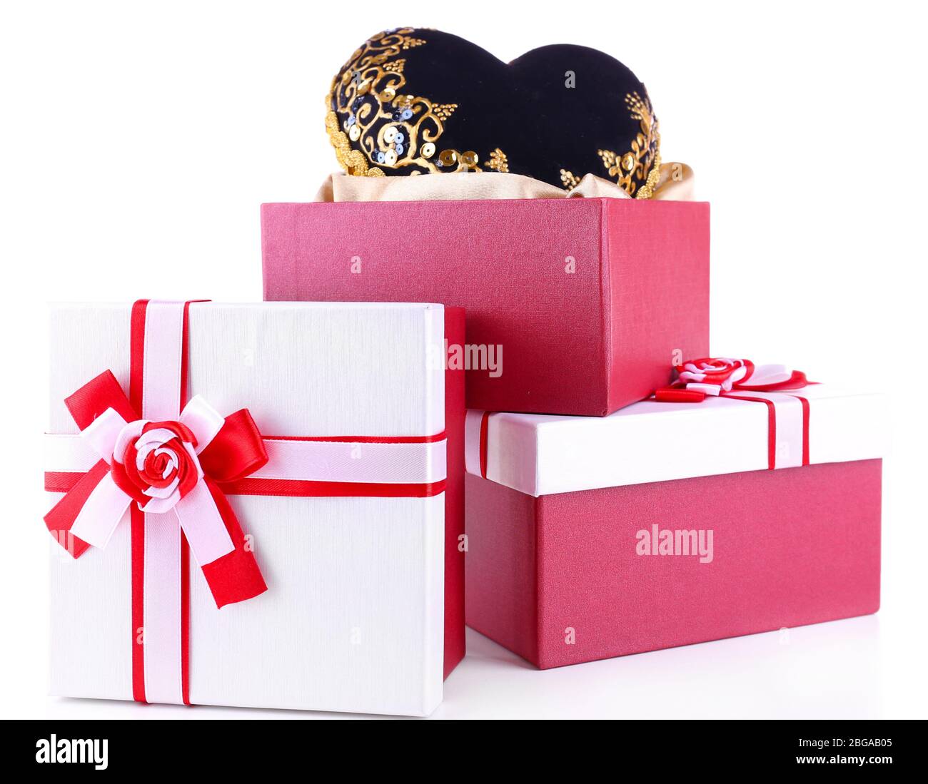 Stack of gift boxes and decorative heart, isolated on white Stock Photo ...