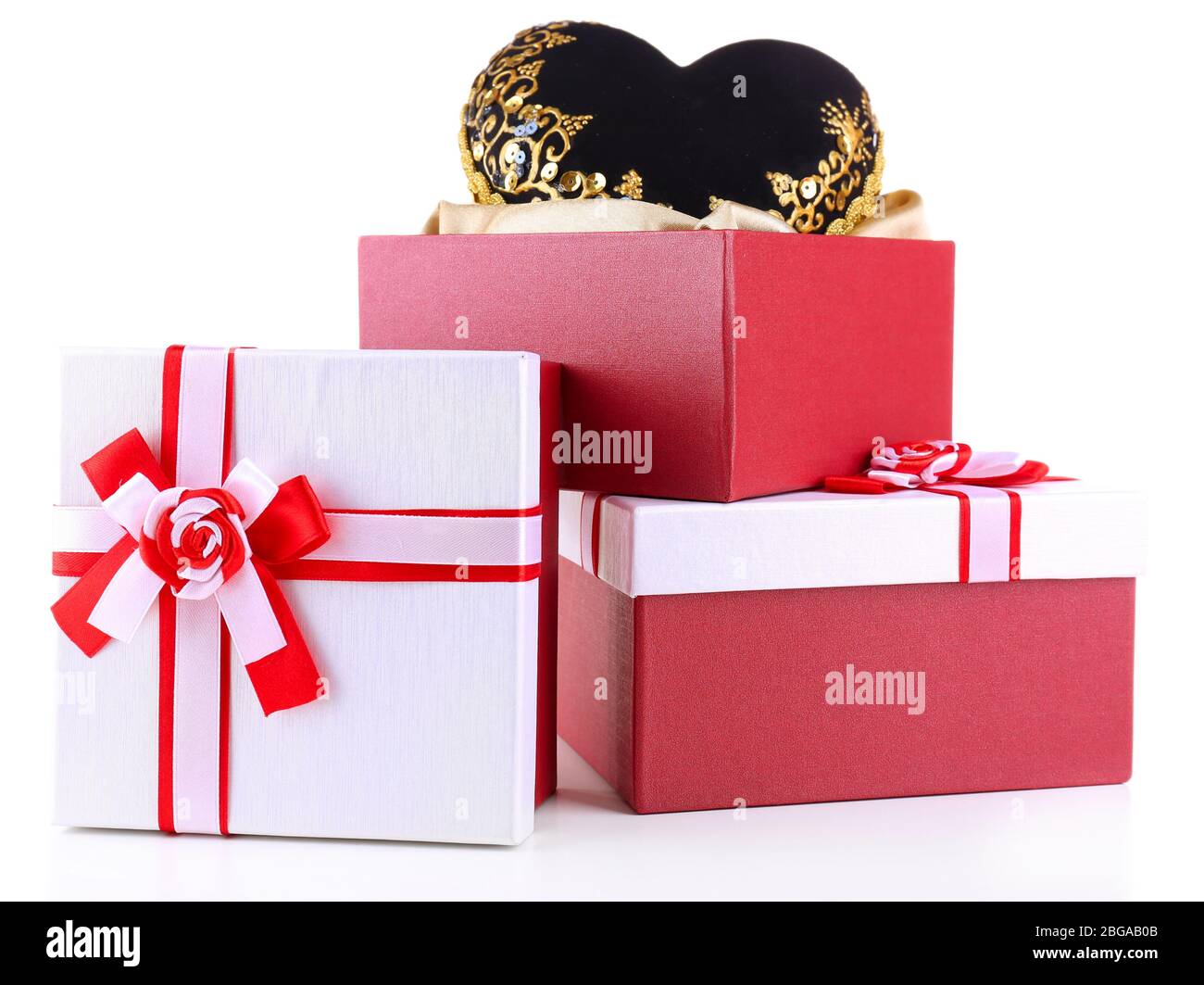 Stack of gift boxes and decorative heart, isolated on white Stock Photo ...