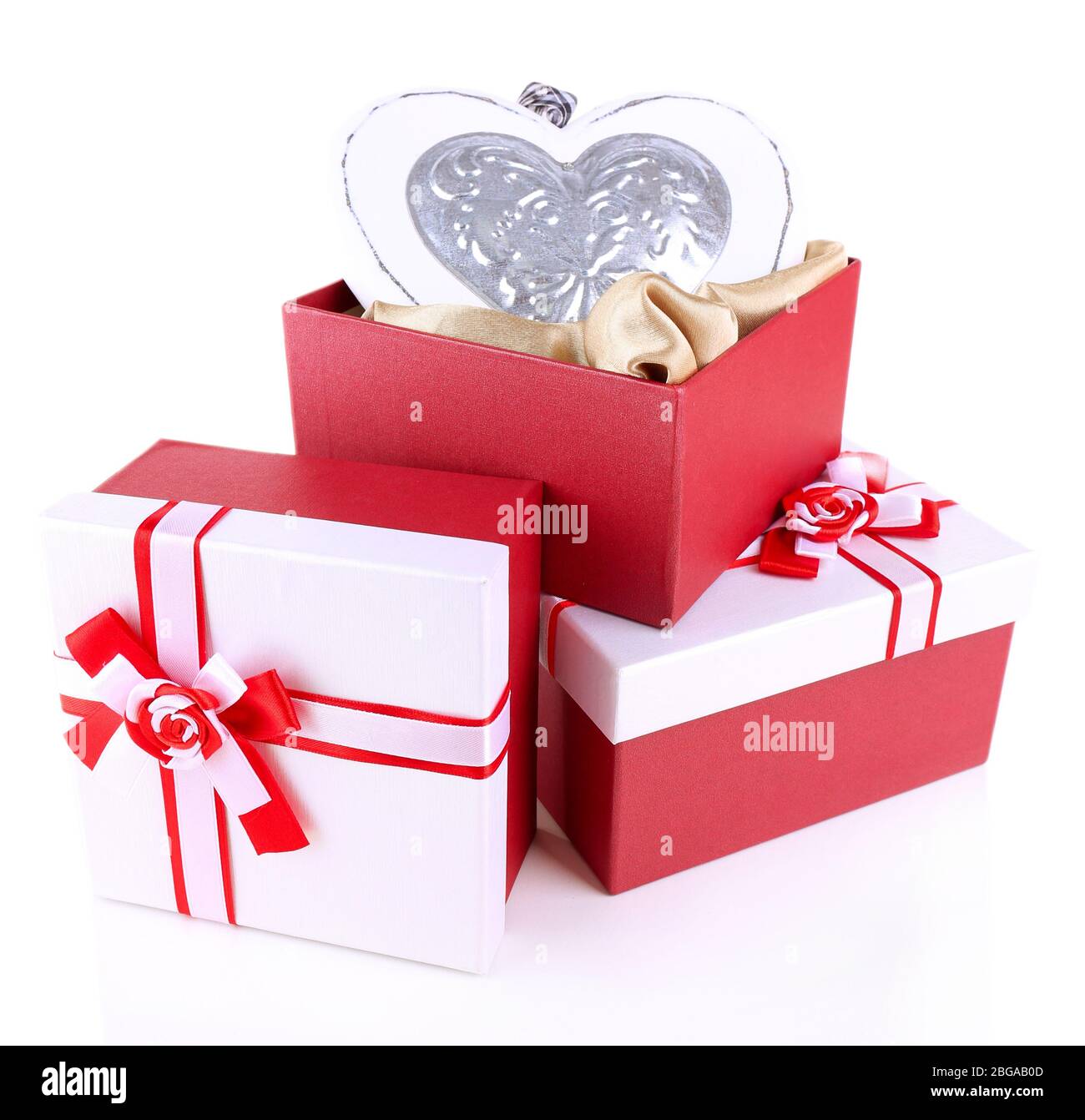 Stack of gift boxes and decorative heart, isolated on white Stock Photo ...