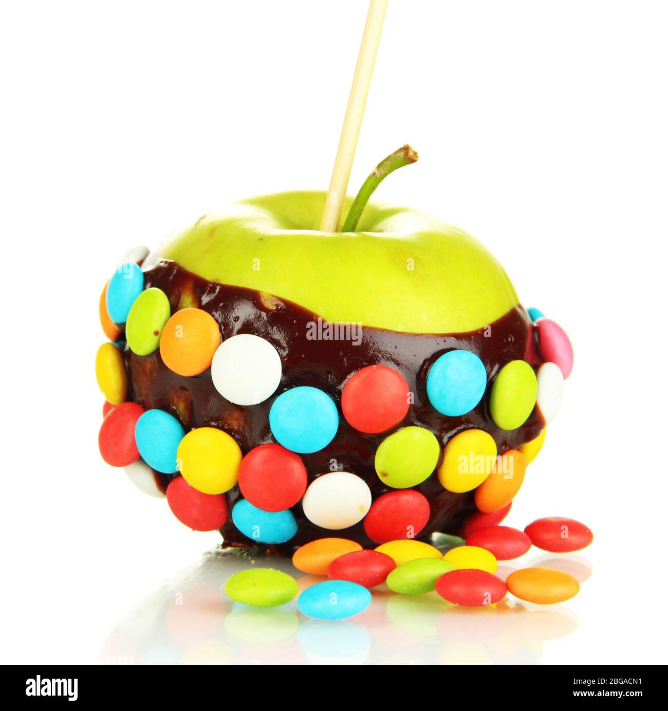 Candied apple on stick isolated on white Stock Photo - Alamy
