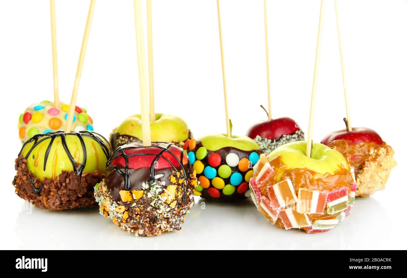 Candied apple on stick isolated on white Stock Photo - Alamy