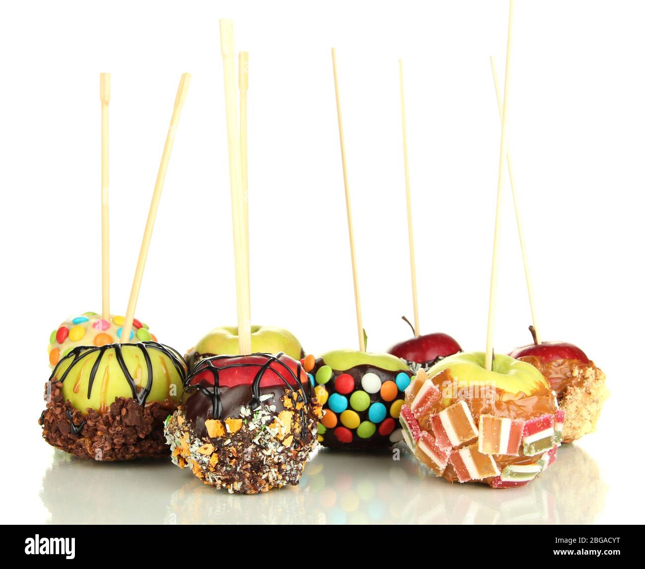 Candied apple on stick isolated on white Stock Photo - Alamy