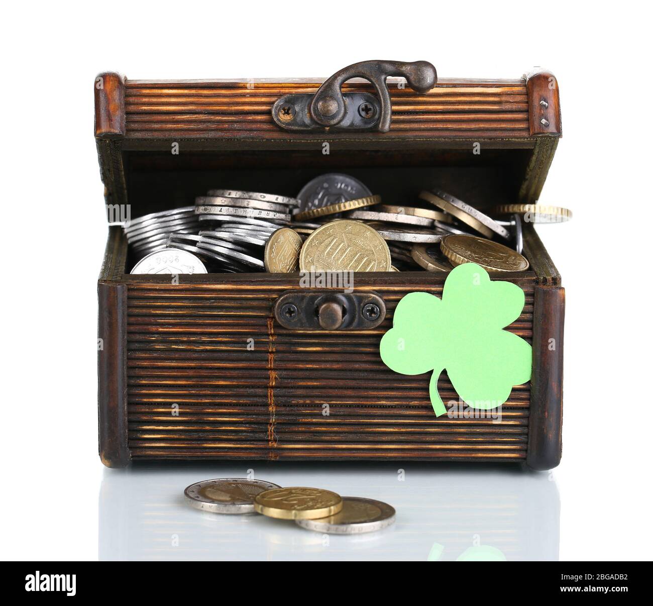 Chest with coins isolated on white Stock Photo - Alamy