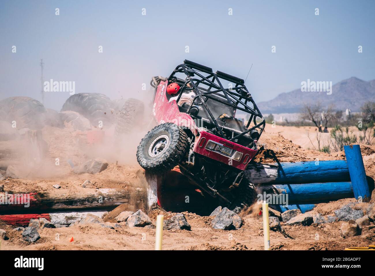 Off-road vehicles going through an obstacle cousre Stock Photo - Alamy