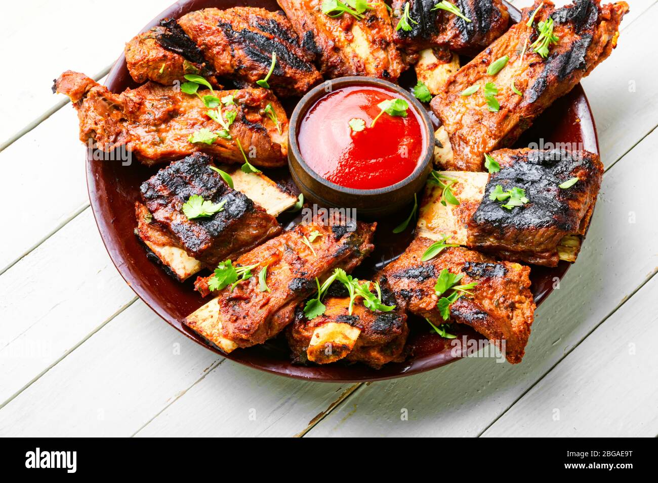 BBQ grilled ribs.Grilled juicy barbecue beef ribs in a plate Stock ...