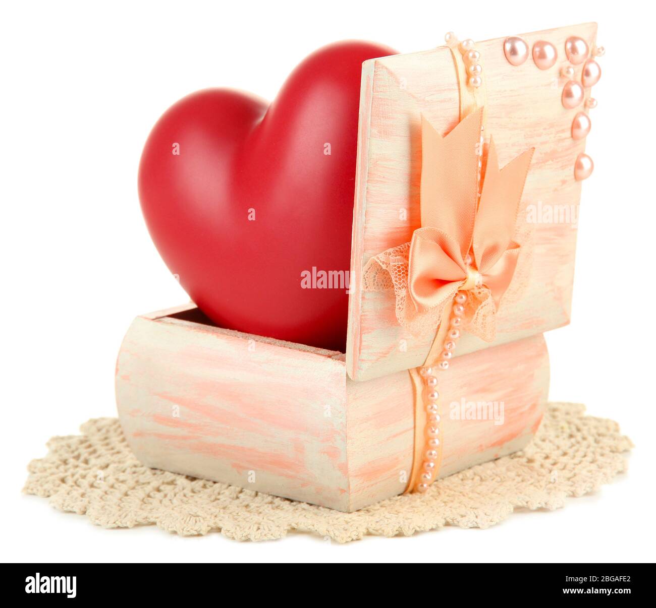 Heart in wooden casket, isolated on white background Stock Photo - Alamy