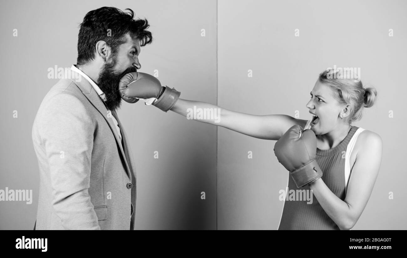 Couple in love competing in boxing. Conflict concept. Gender battle ...