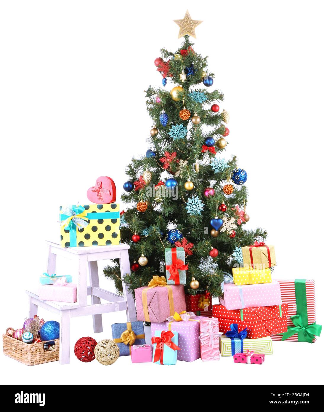 Decorated Christmas tree with gifts isolated on white Stock Photo - Alamy