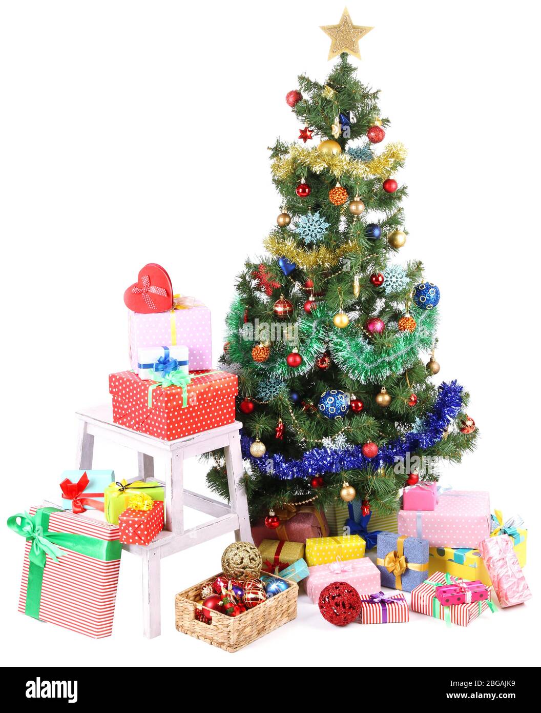 Decorated Christmas tree with gifts isolated on white Stock Photo - Alamy