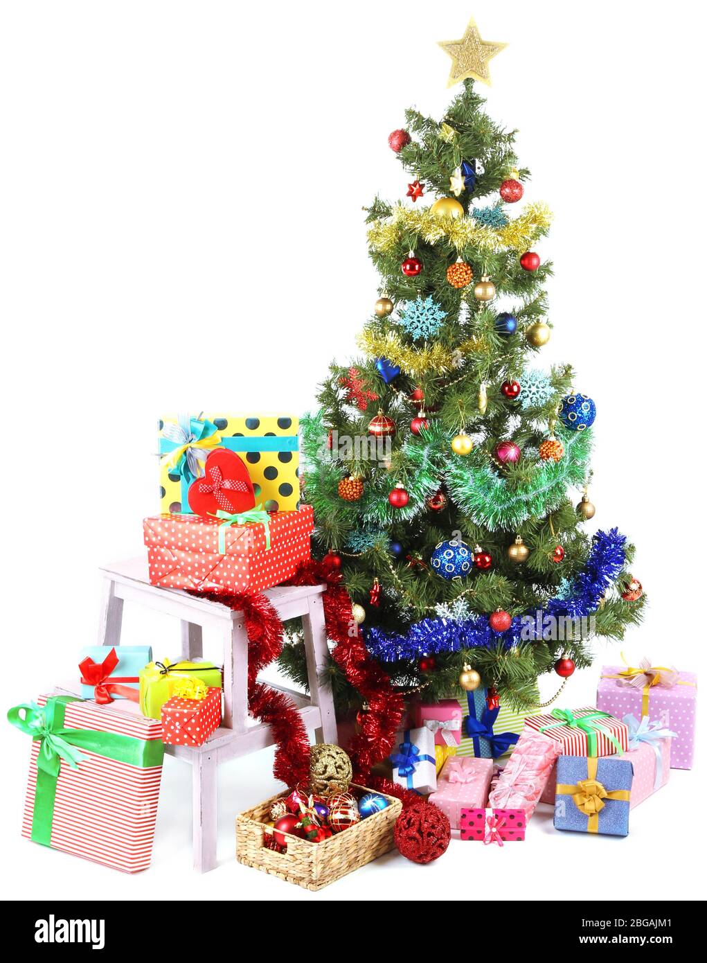 Decorated Christmas tree with gifts isolated on white Stock Photo - Alamy