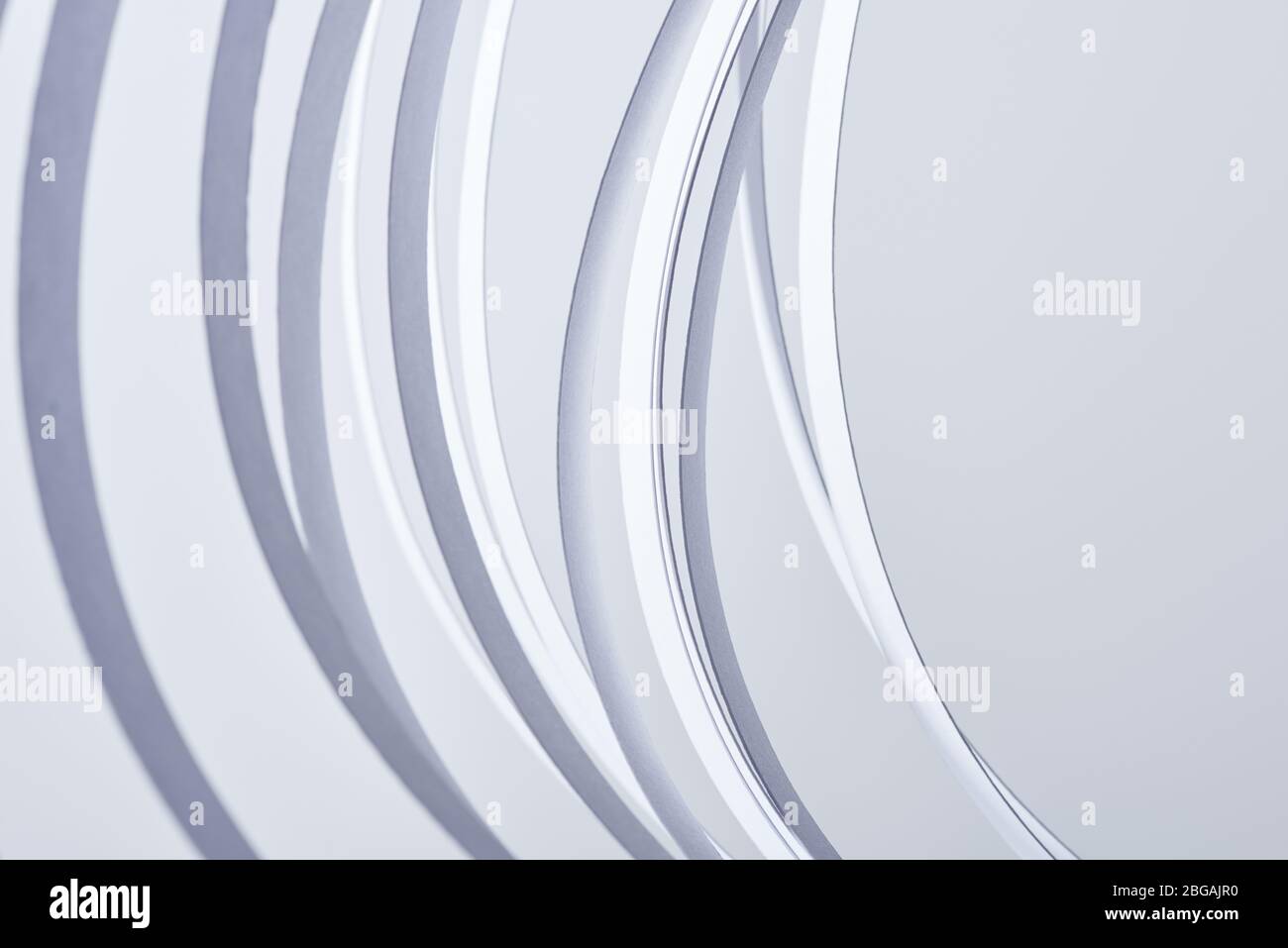close up view of curved paper stripes isolated on white Stock Photo - Alamy