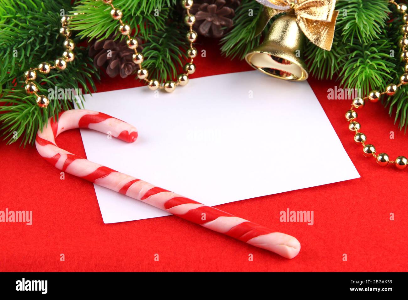 Christmas card on red background Stock Photo - Alamy